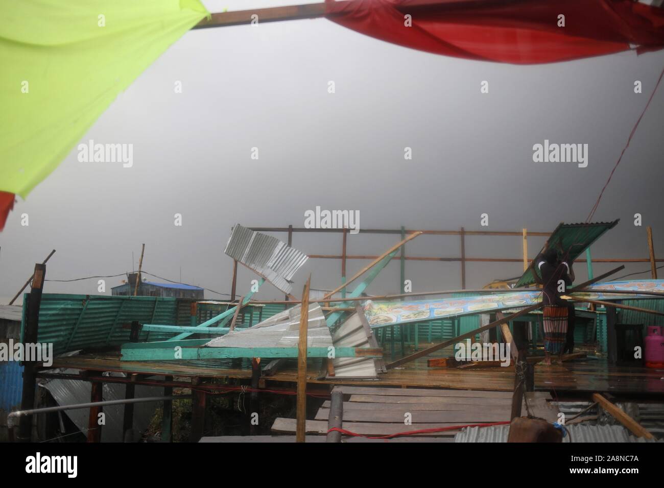 Munshiganj, Bangladesh. 10th Nov, 2019. A vendor works in his shop ...