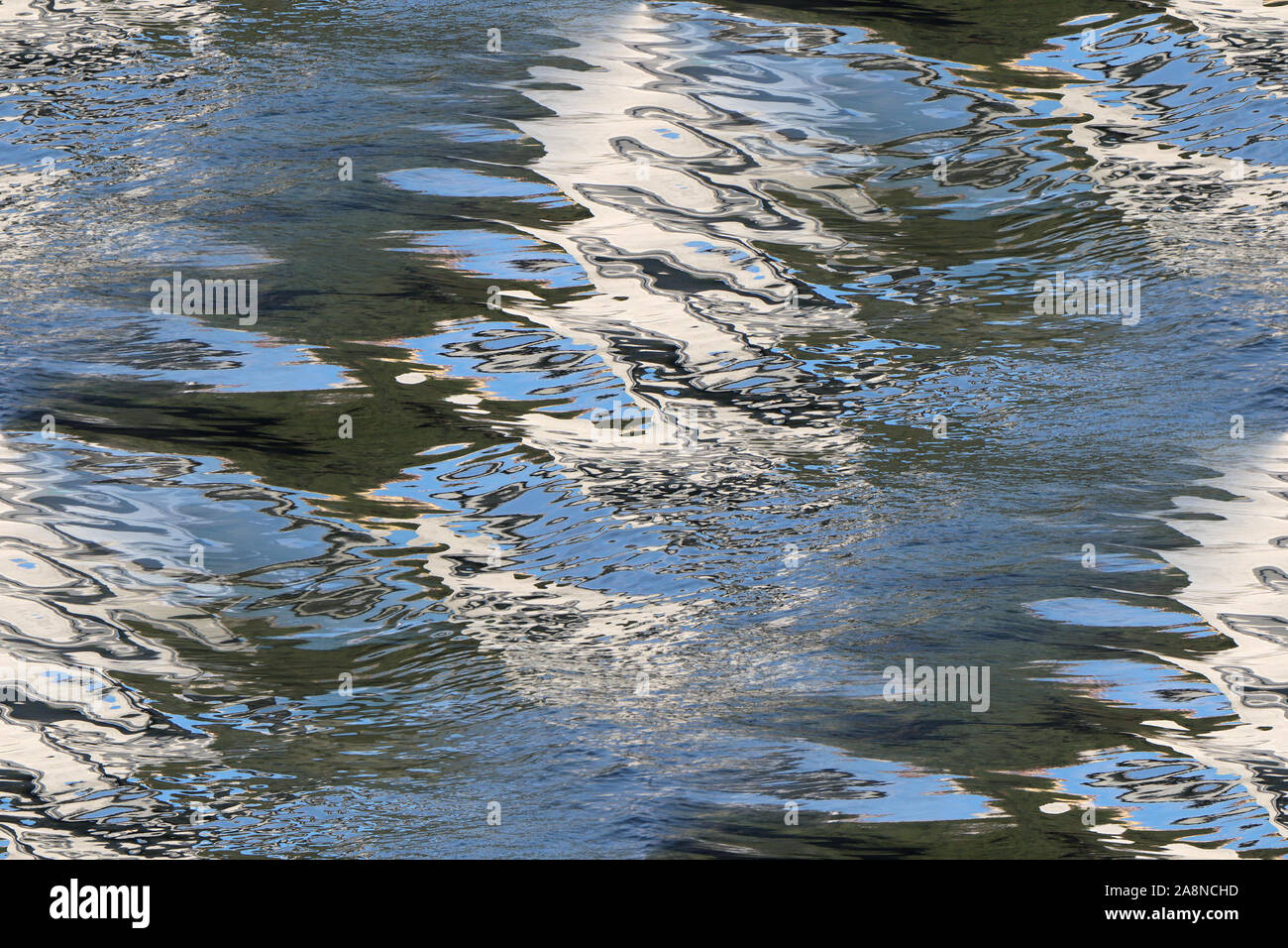Reflection of the coast on the surface of the water as seamless ...