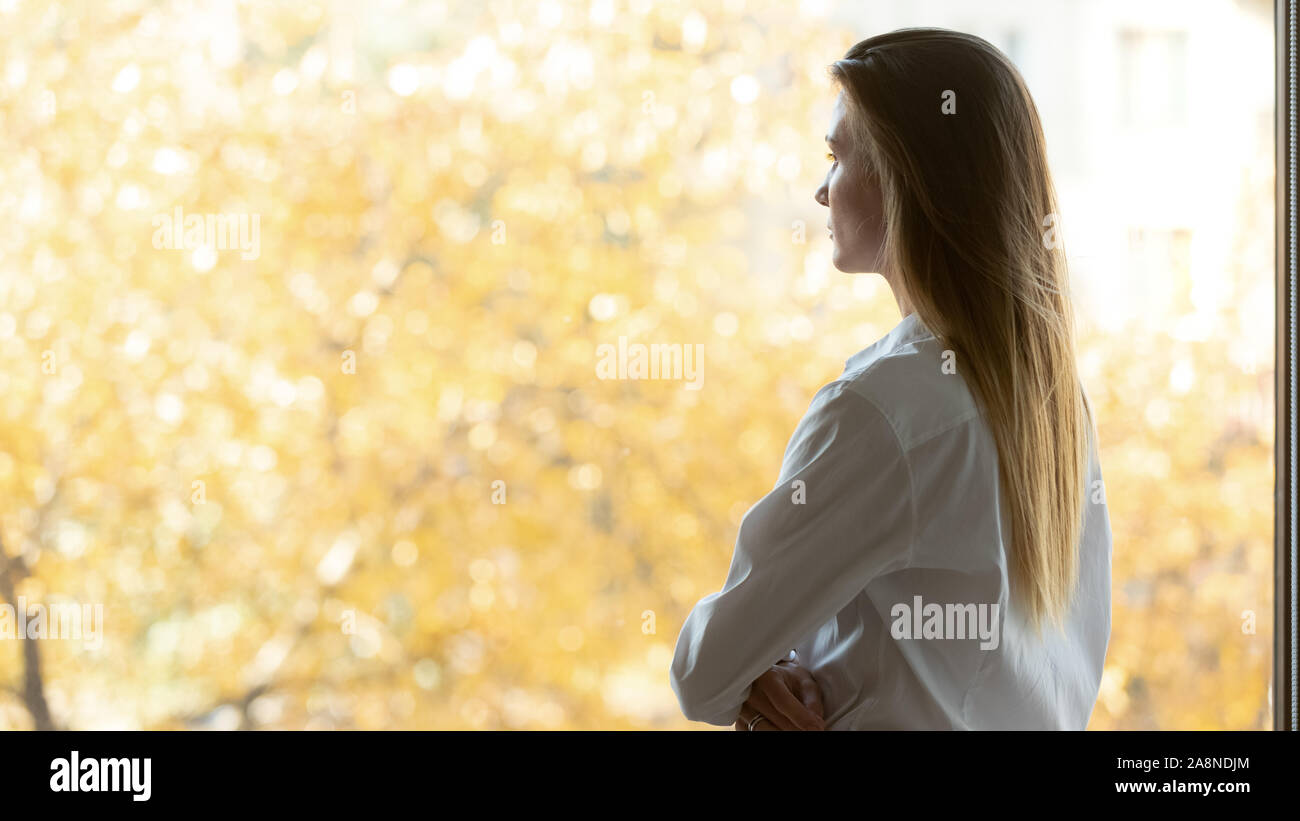 Back view of pensive businesswoman look in distance thinking Stock ...