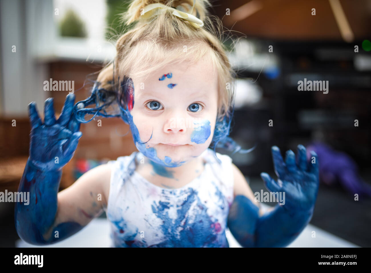 School girl colouring in picture hi-res stock photography and images ...