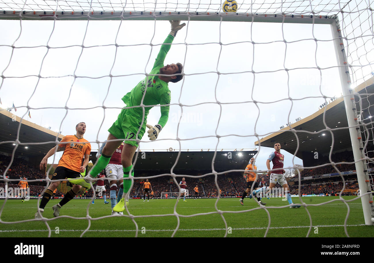 Aston Villa goalkeeper Jed Steer makes a save before getting an injury ...