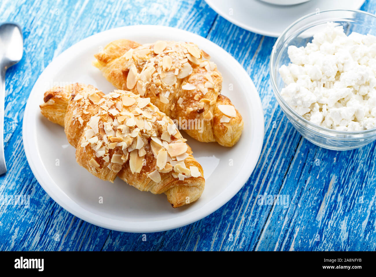 traditional french breakfast. croissant with cottage cheese and coffee ...