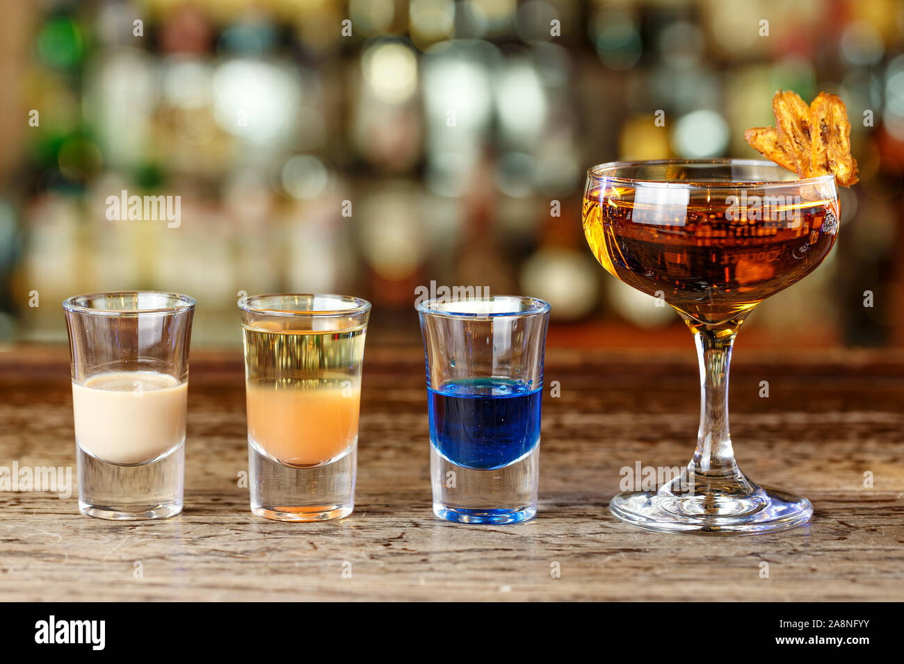 Assortment of cocktails in the restaurant, many different alcoholic ...