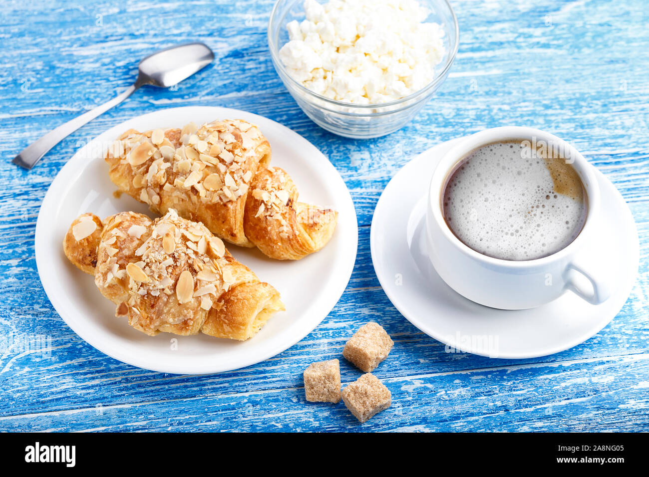 traditional french breakfast. croissant with cottage cheese and coffee ...