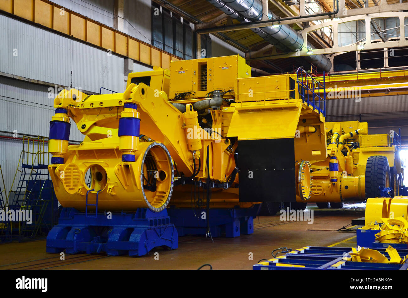 Production process of heavy mining trucks at the factory. Dump truck on ...