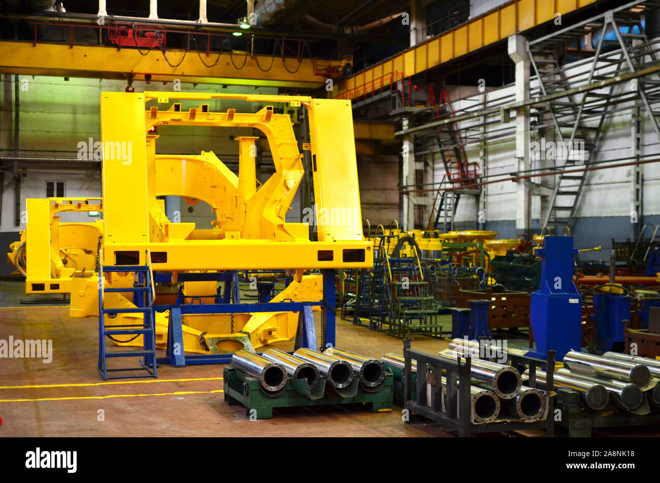 Production process of heavy mining trucks at the factory. Dump truck on ...