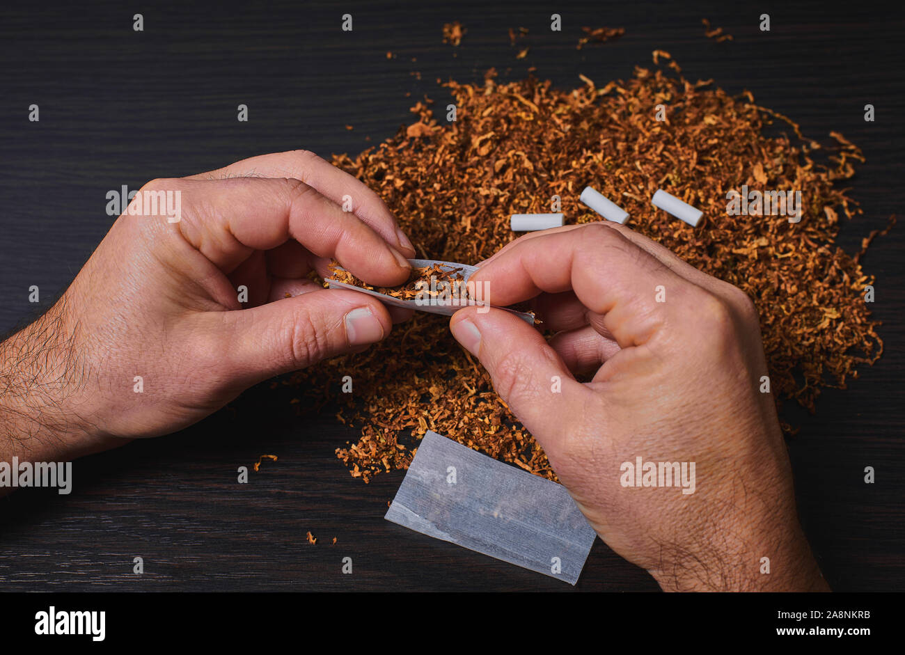 Roll up cigarette hi-res stock photography and images - Alamy