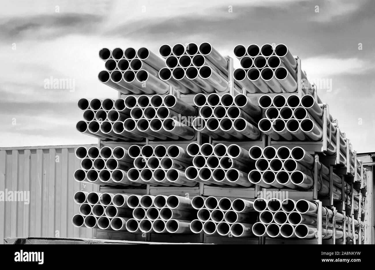 Folded aluminum tubes round in packaging. Outdoors Stock Photo - Alamy