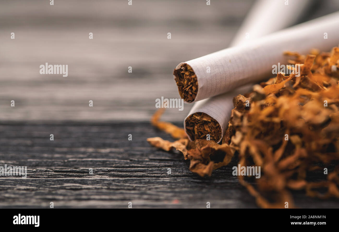 Cigarettes tobacco on wooden hi-res stock photography and images - Alamy