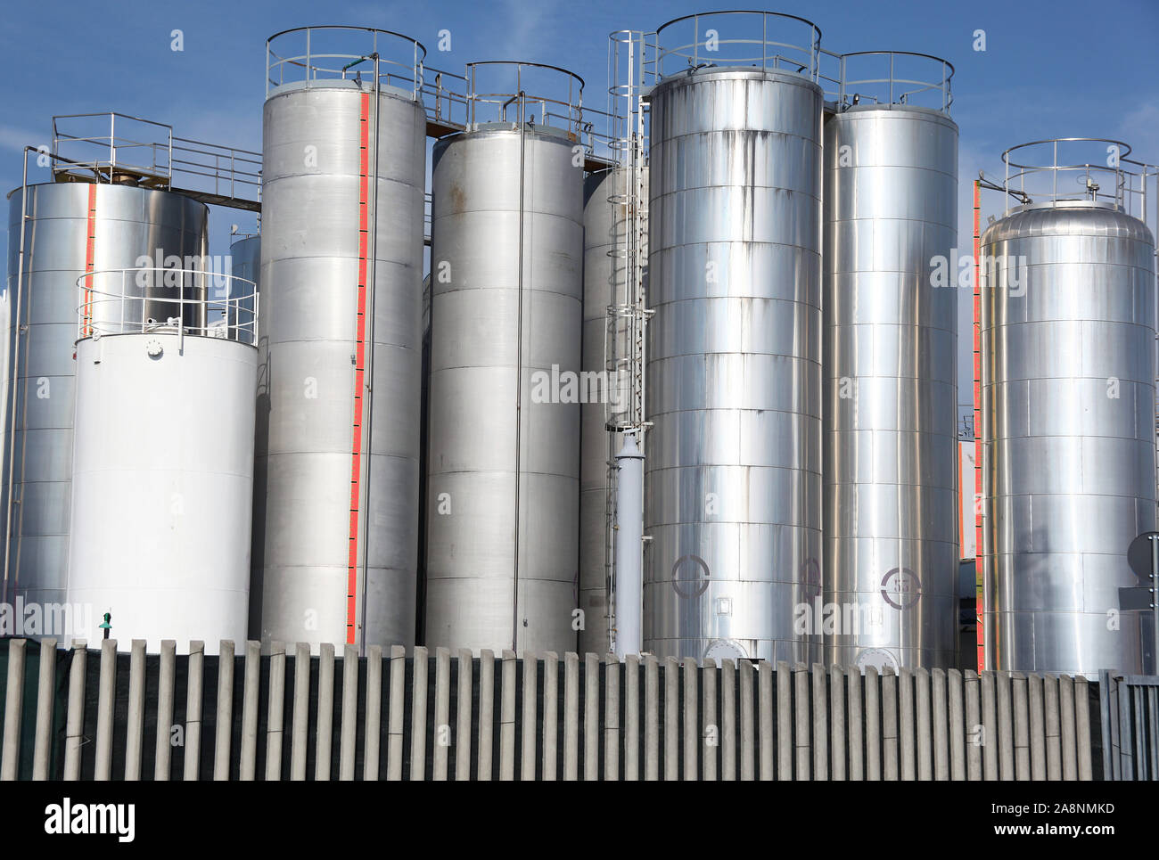 a Metallic silos of a chemical plant Stock Photo - Alamy
