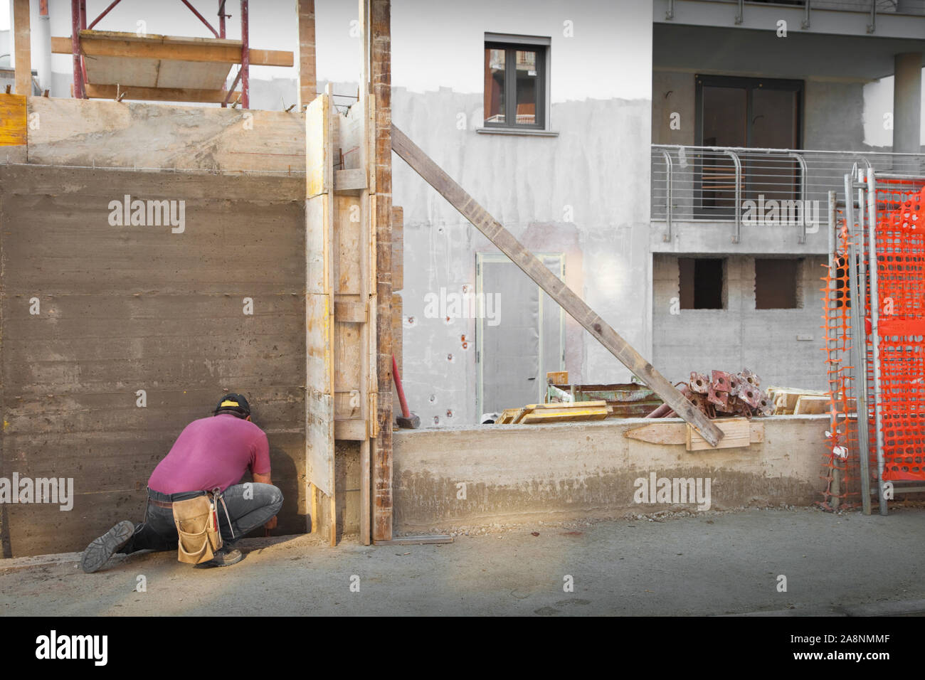 a Worker working in a construction site Stock Photo - Alamy