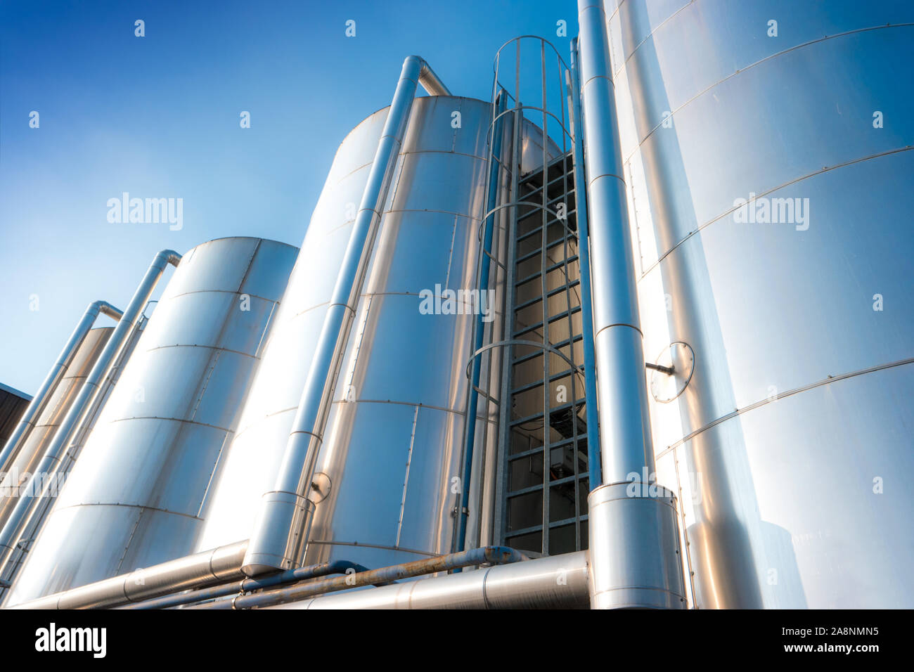 a Metallic silos of a chemical plant Stock Photo - Alamy