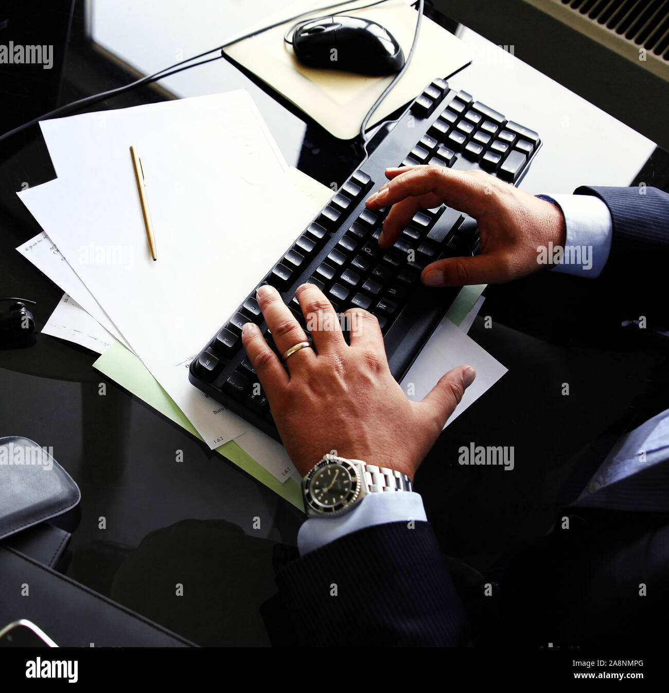 a manager at work in the office Stock Photo - Alamy