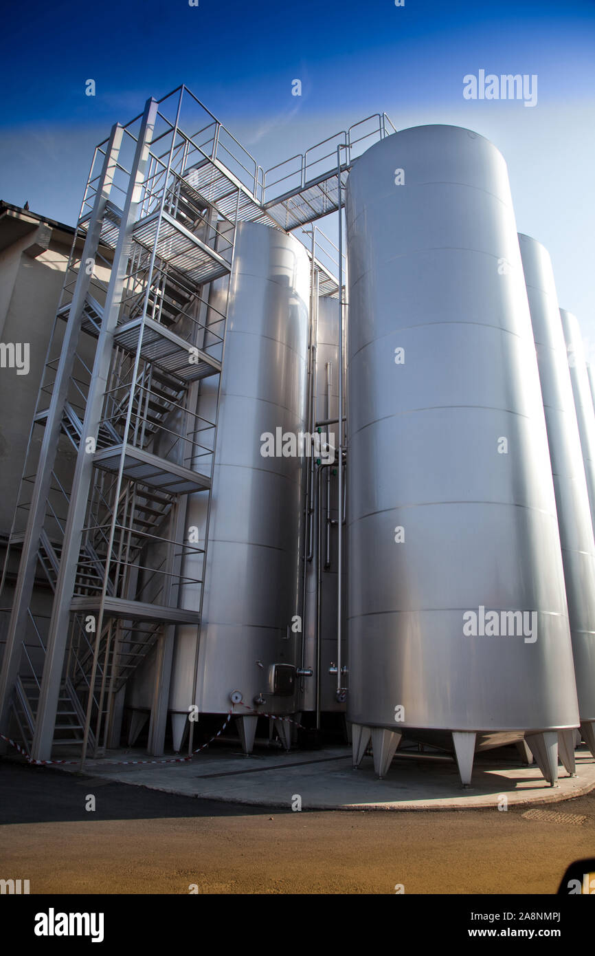 a Metallic silos of a chemical plant Stock Photo - Alamy