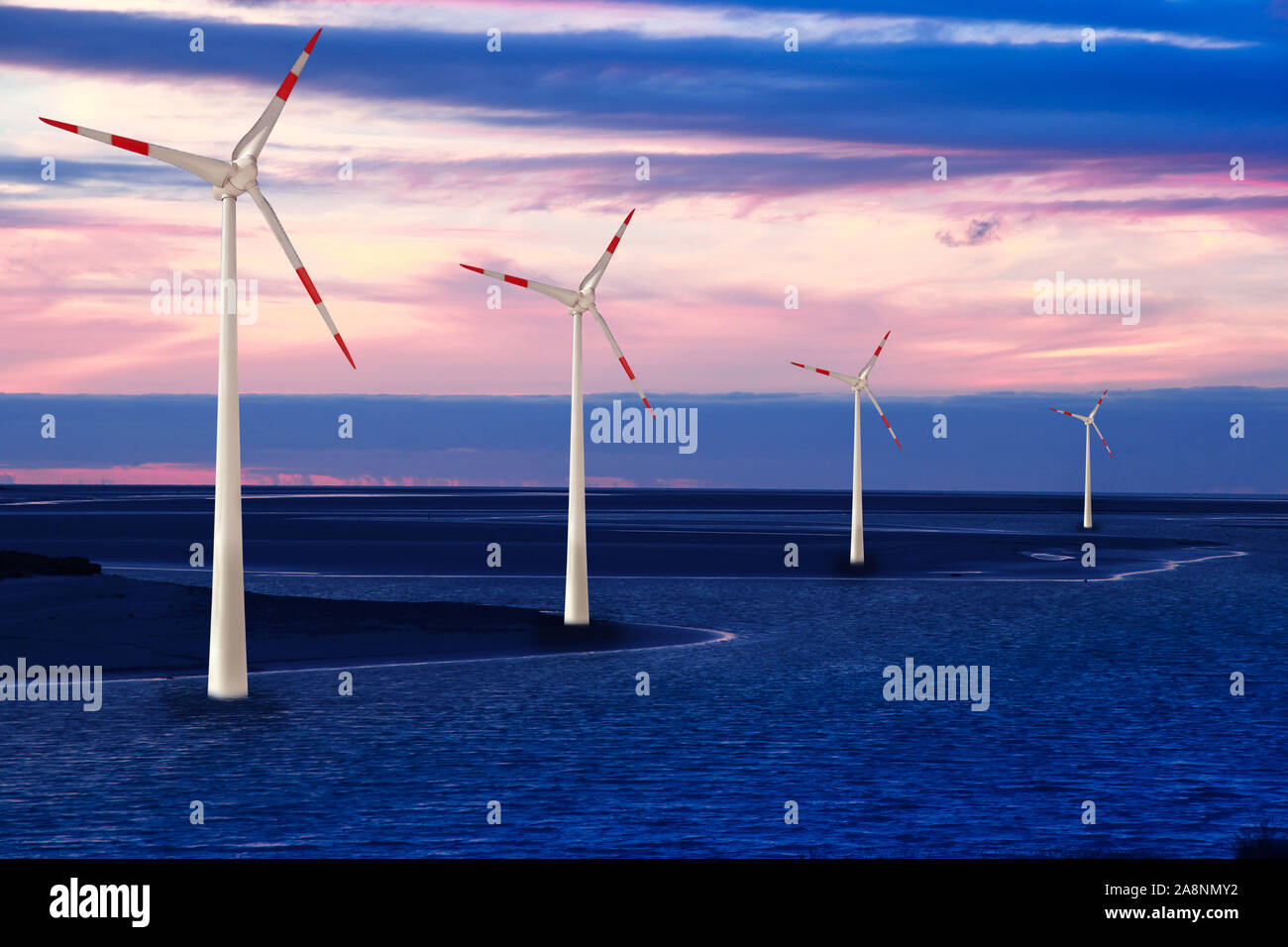 wind turbine on sunset background Stock Photo - Alamy
