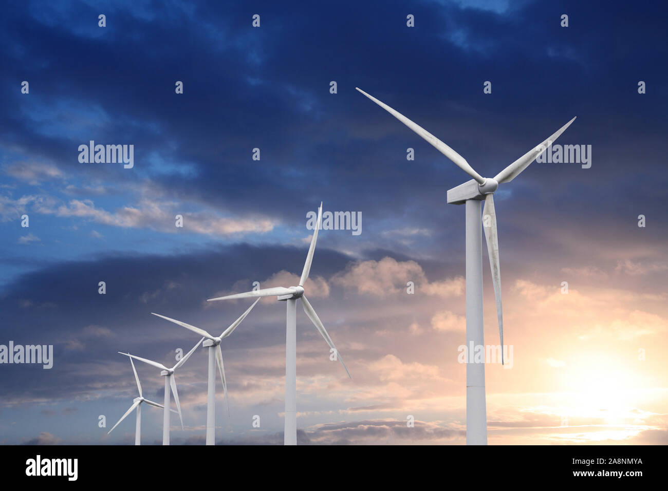 wind turbine on sunset background Stock Photo - Alamy