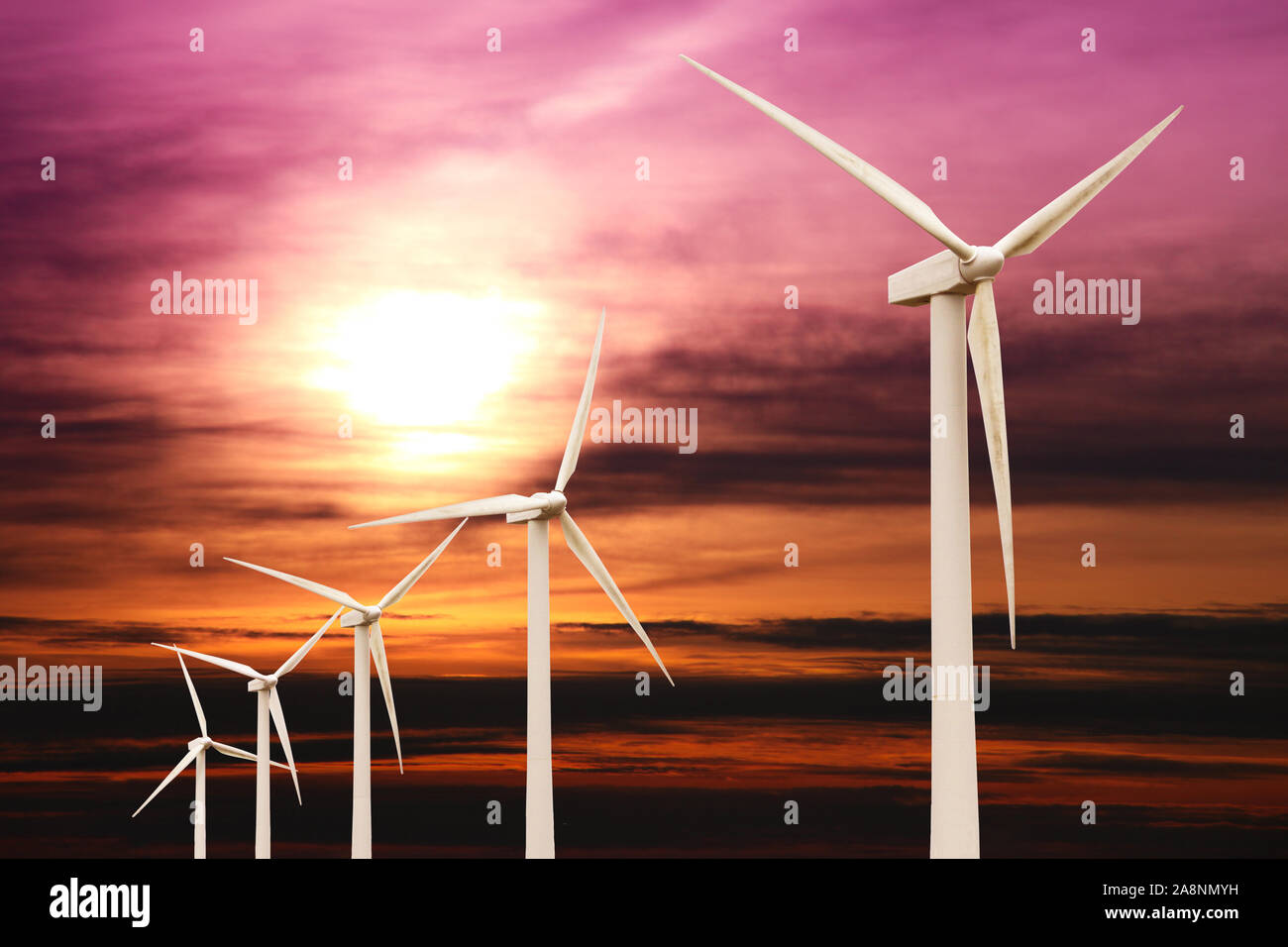 wind turbine on sunset background Stock Photo - Alamy