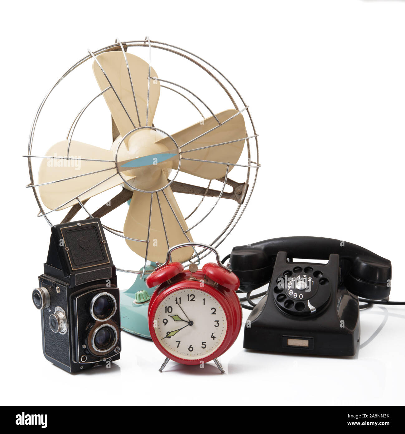 four Vintage objects on white background Stock Photo - Alamy