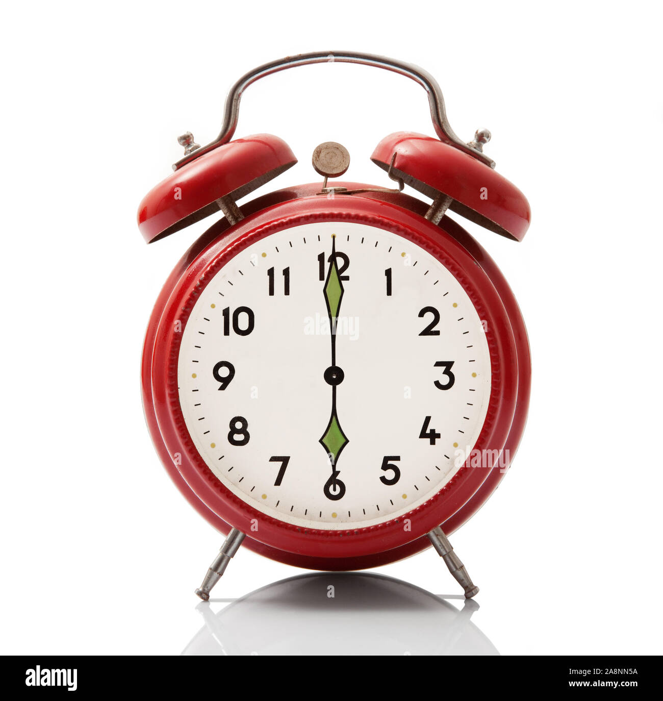 isolated alarm clock at six hour on white background Stock Photo - Alamy