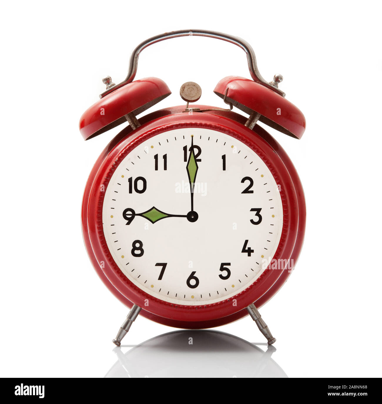 isolated alarm clock at nine hour on white background Stock Photo - Alamy