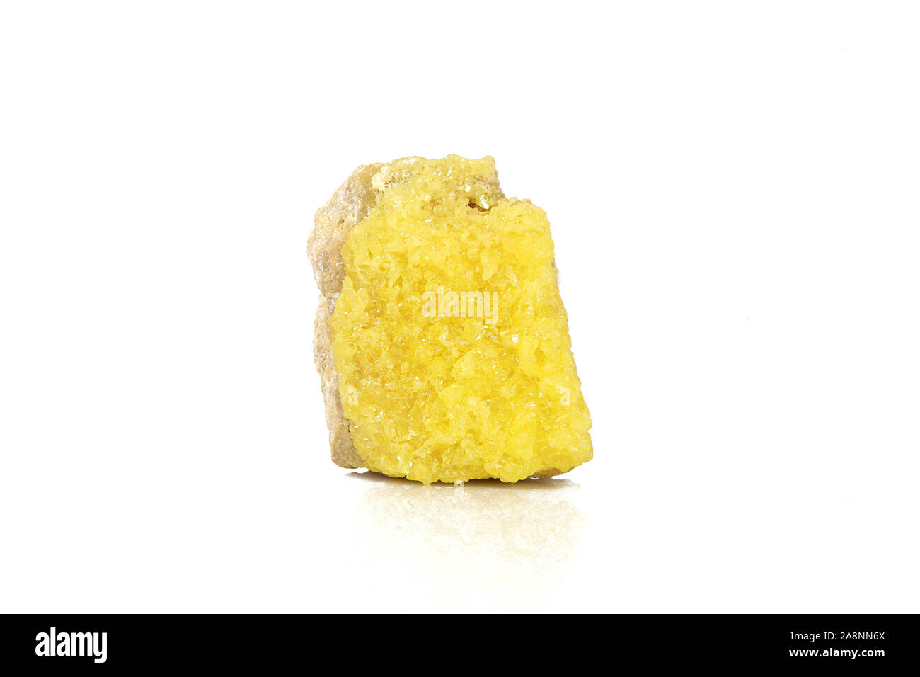 Sulphur crystals on white background Stock Photo - Alamy