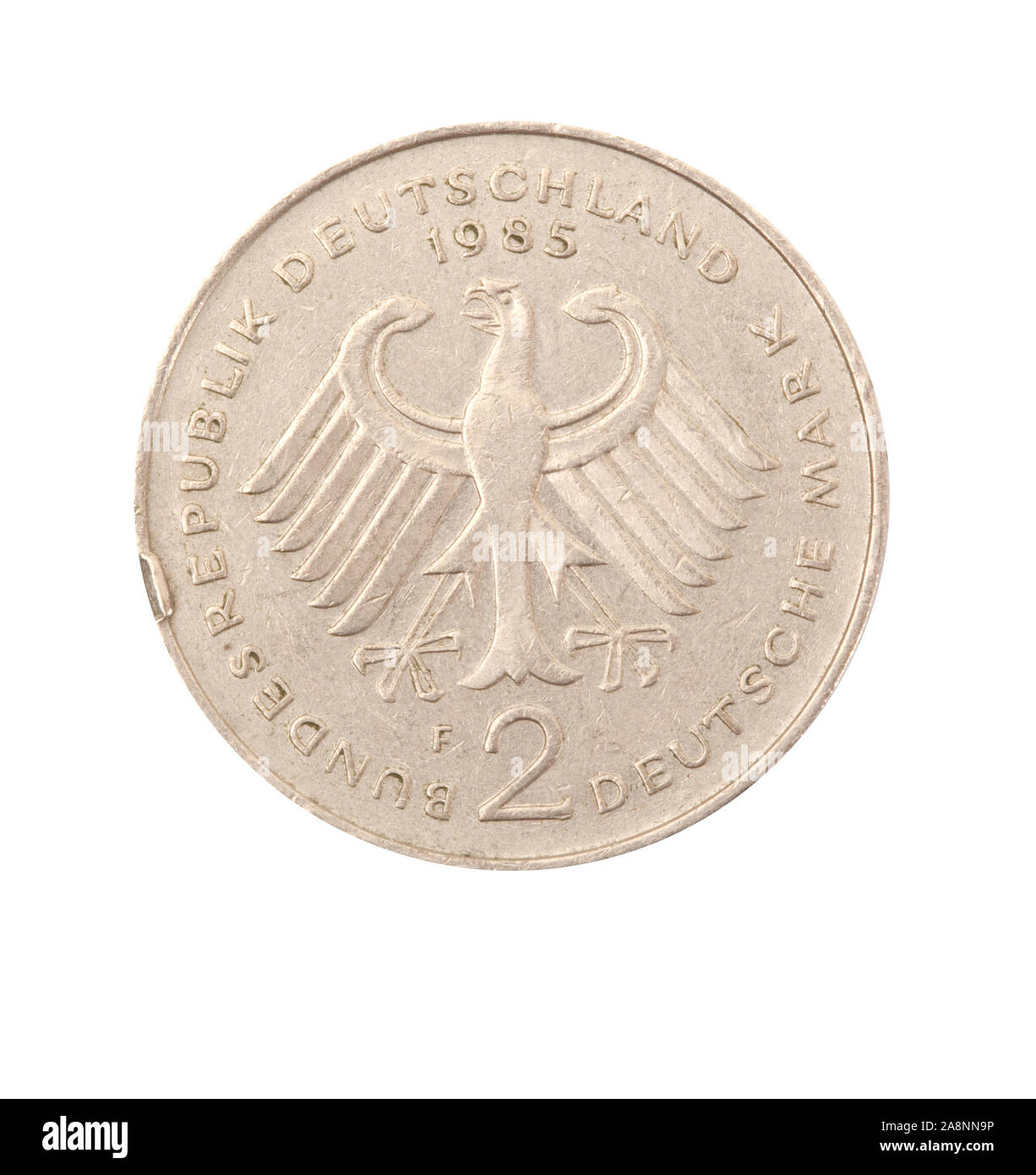 vintage metal coin on white background Stock Photo - Alamy