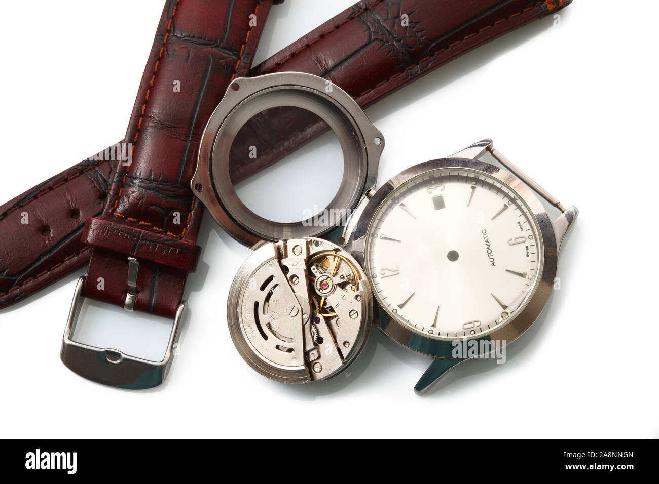 broken watch on white background Stock Photo - Alamy