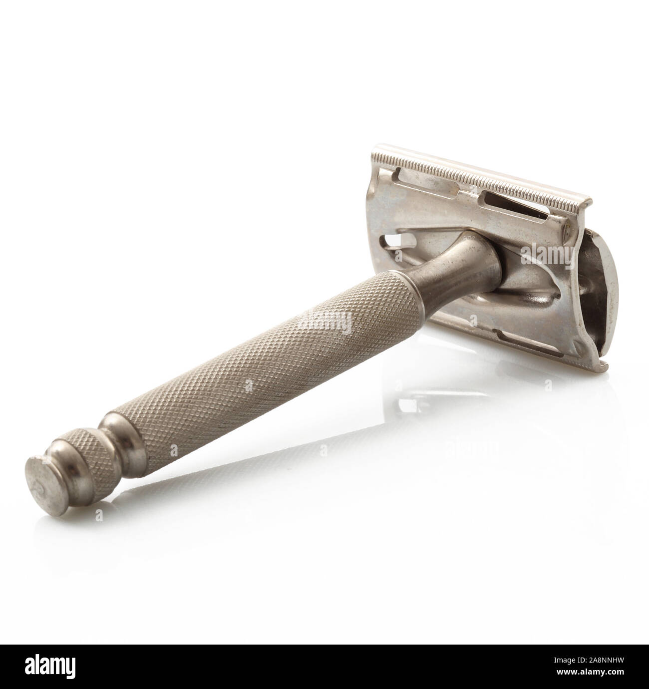 old razor on white background Stock Photo - Alamy