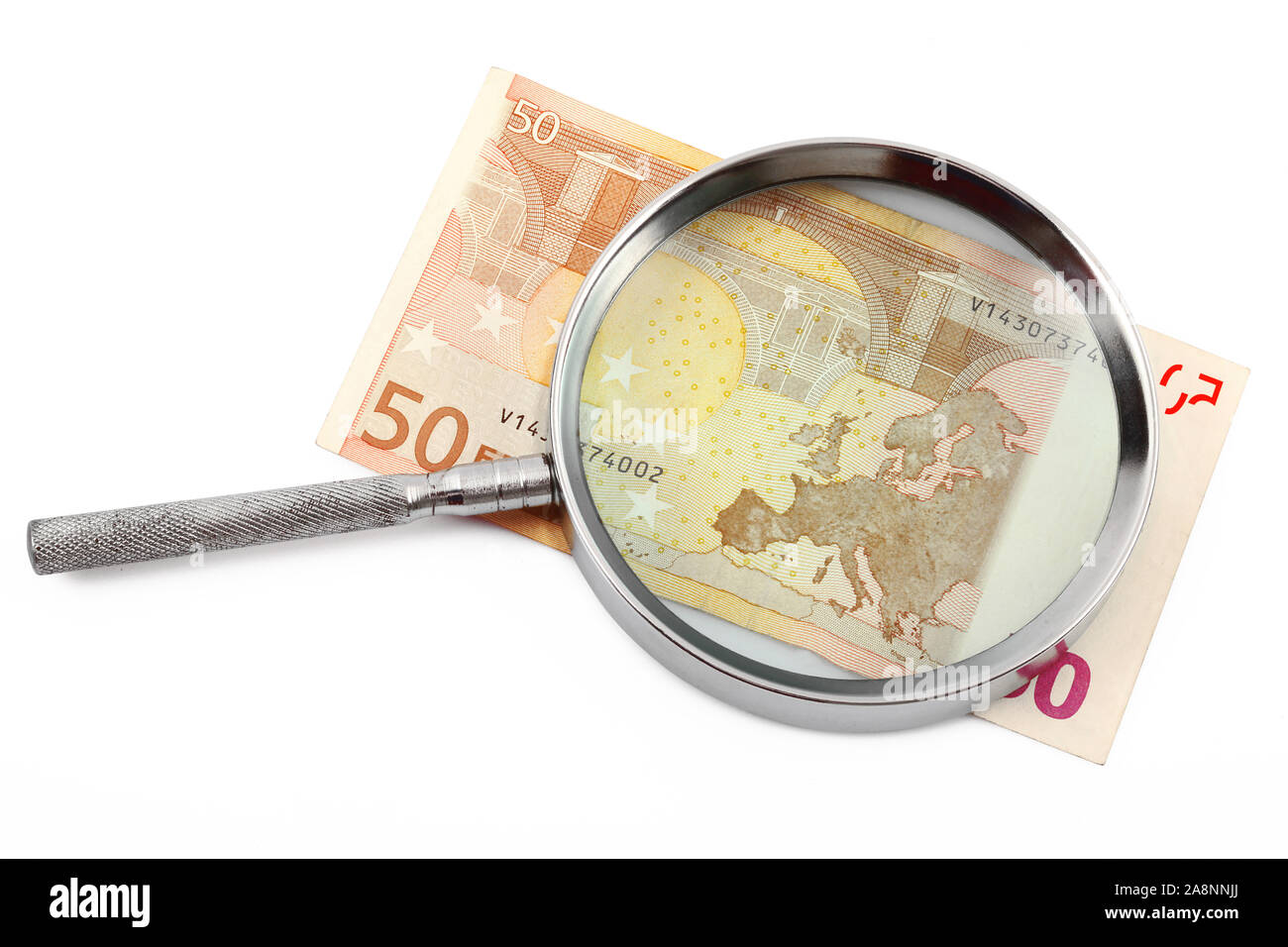 Money under magnifying glass on white background Stock Photo - Alamy