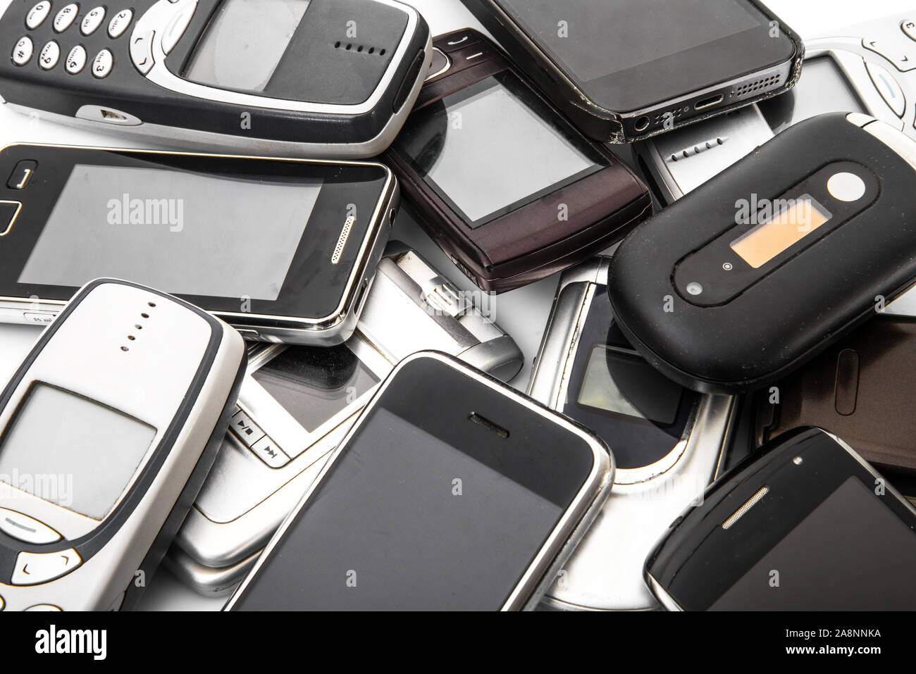 old cellphone on white background Stock Photo - Alamy