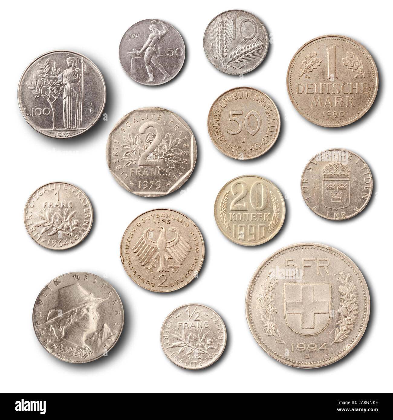 metal coins on white background Stock Photo - Alamy