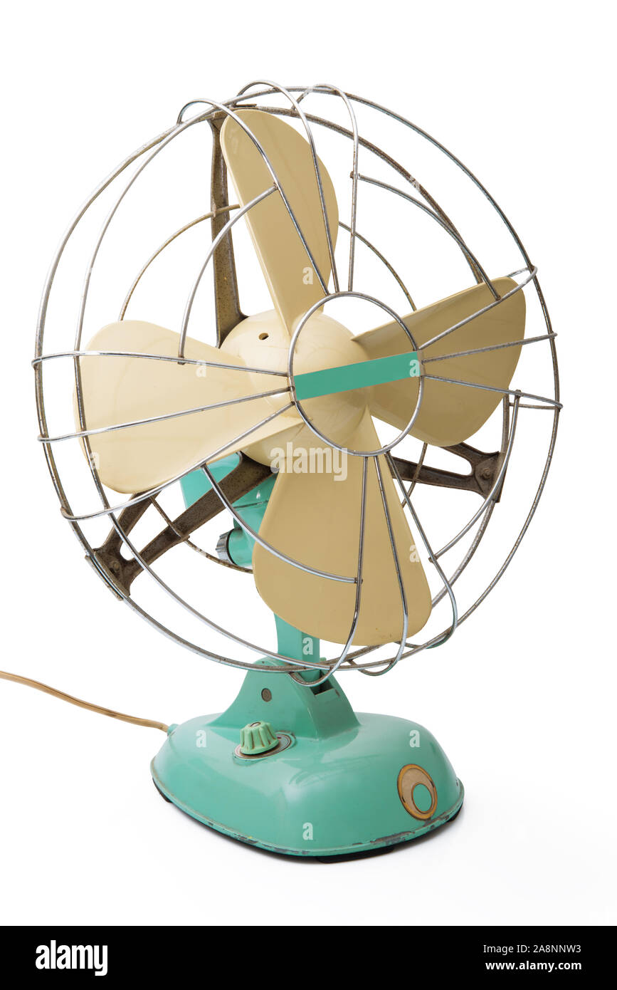 an original vintage fan on white background Stock Photo - Alamy