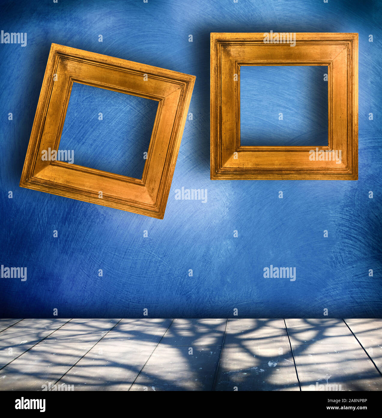 Old frames hanging on the wall Stock Photo - Alamy