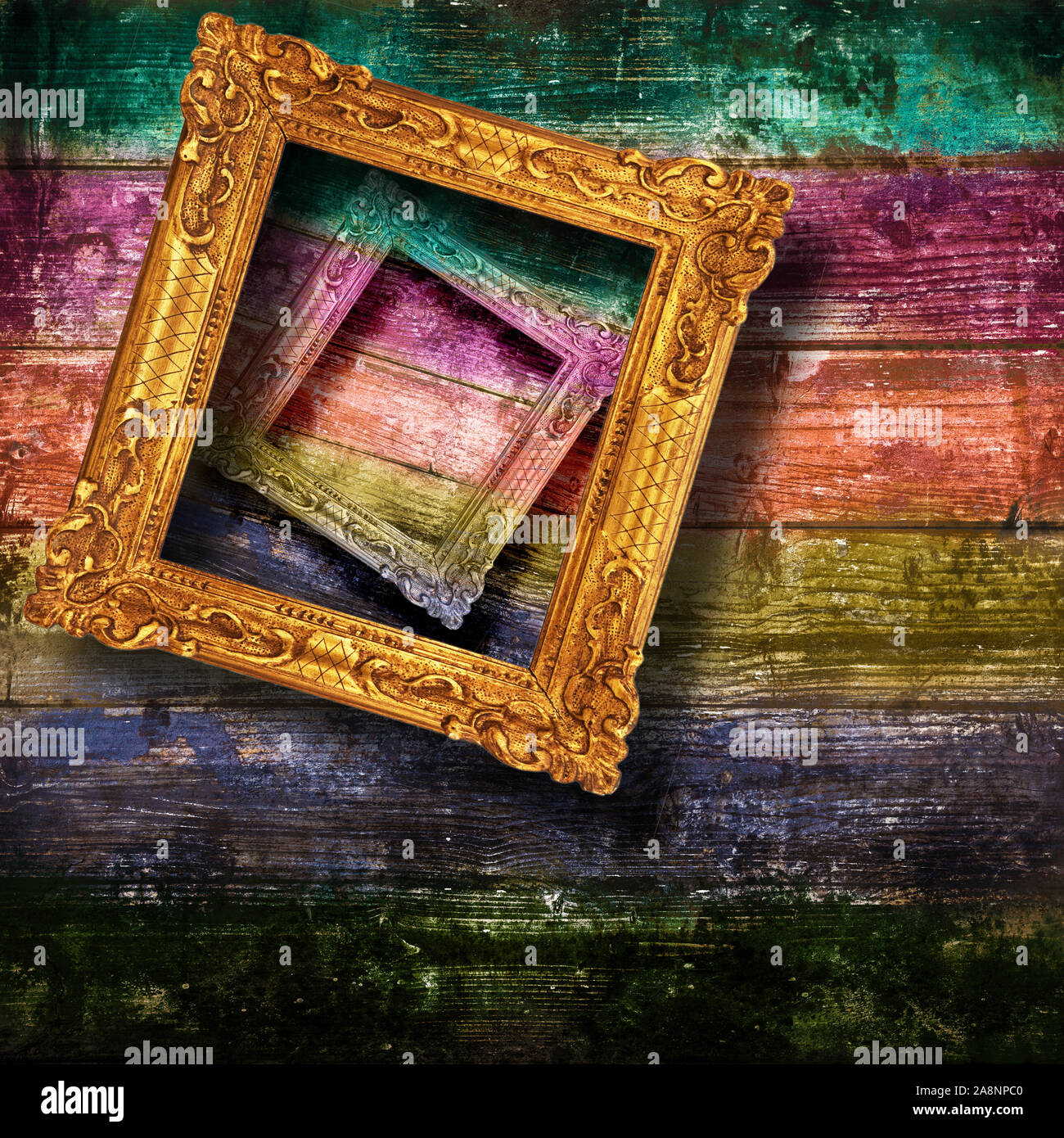 Old frames hanging on wooden wall Stock Photo - Alamy