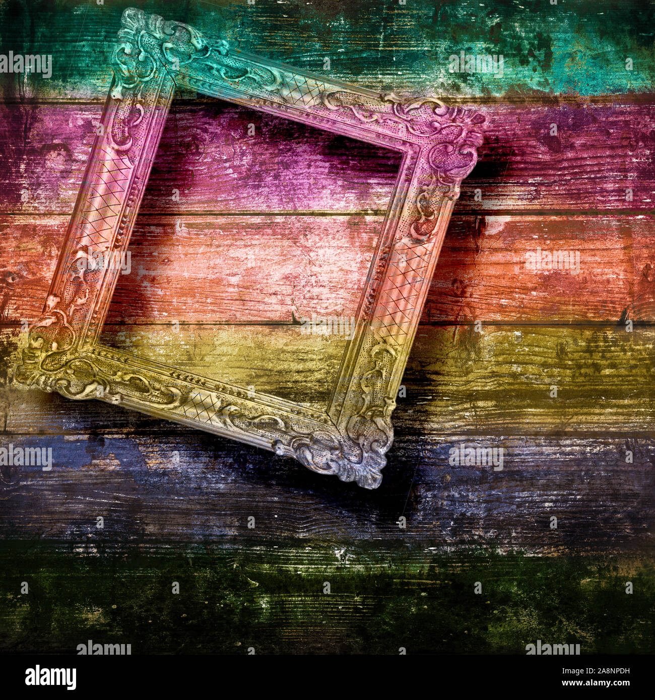 Old frame hanging on wooden wall Stock Photo - Alamy