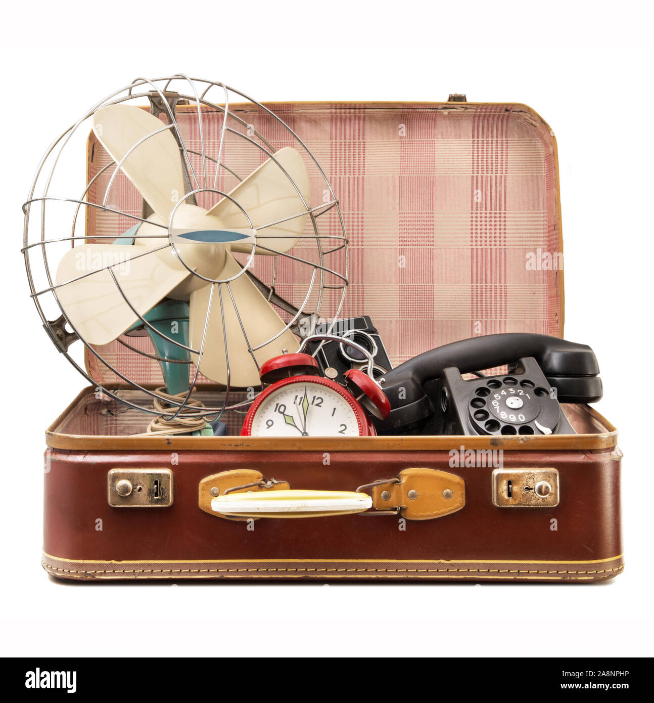 Old suitcase full of vintage objects Stock Photo - Alamy