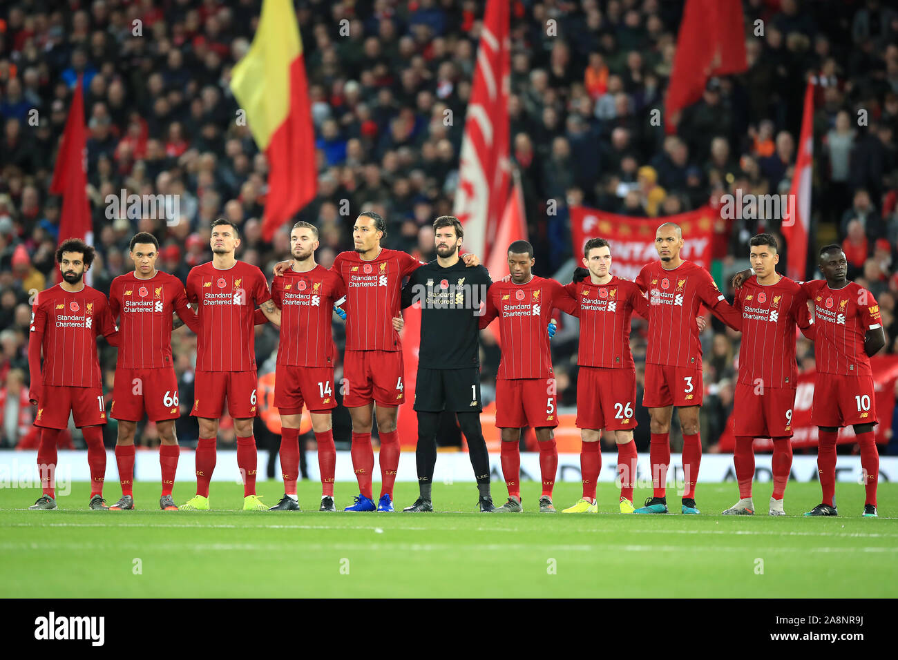 Liverpool players line up prior to kick-off during the Premier League ...