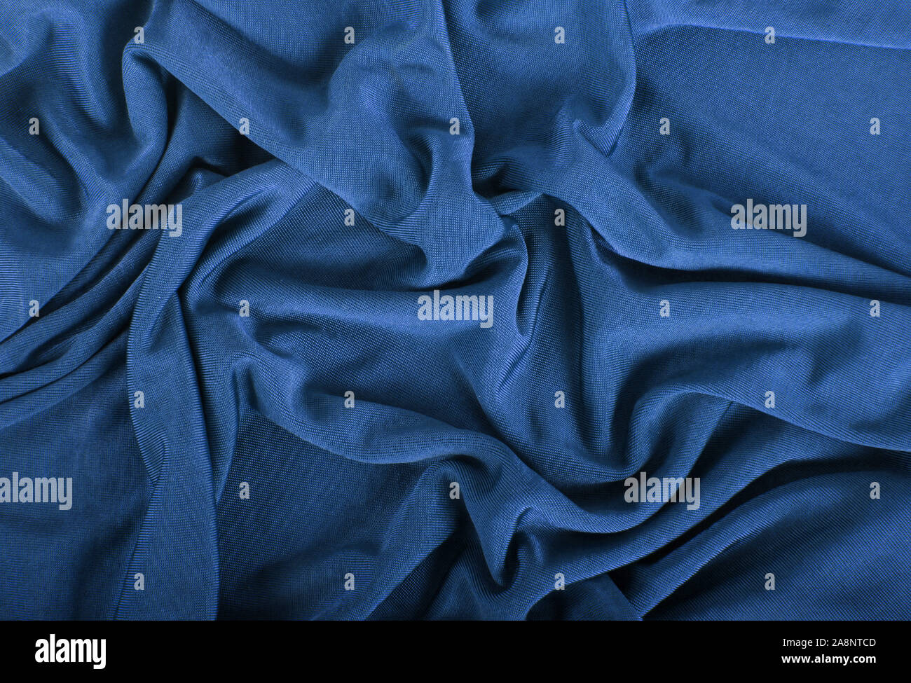 a blue curled cloth background Stock Photo - Alamy