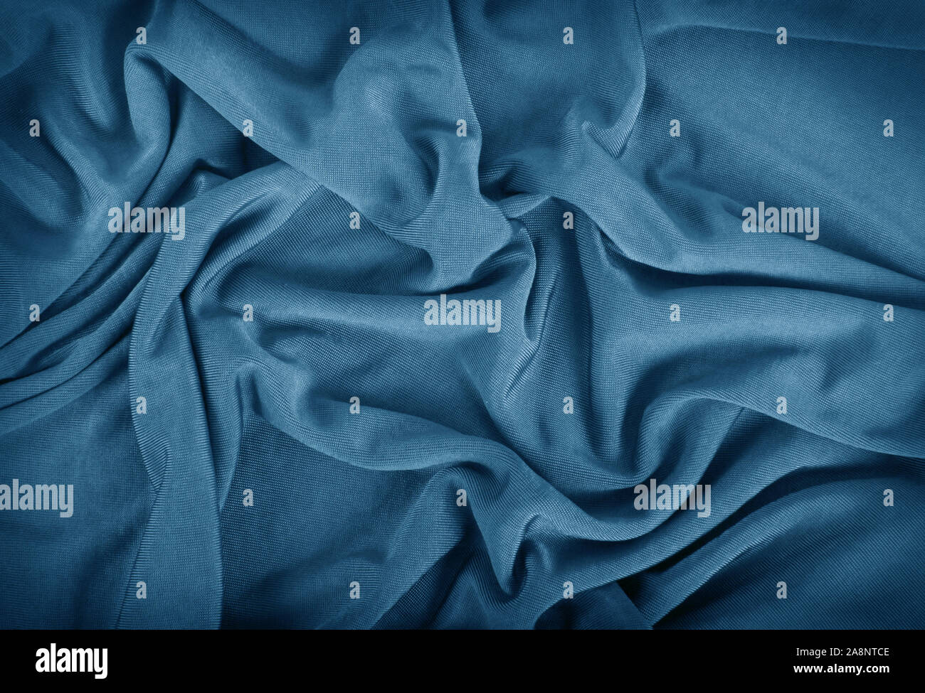 a blue curled cloth background Stock Photo - Alamy