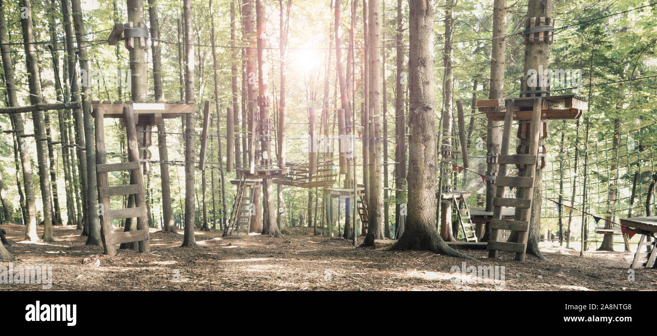 Wood buildings in the forest for climbing on trees Stock Photo - Alamy