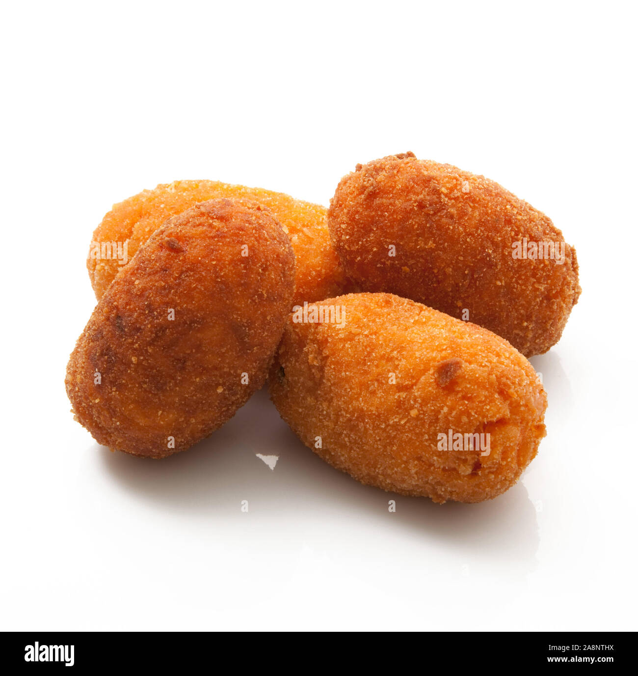 rice fried croquettes on white background Stock Photo - Alamy