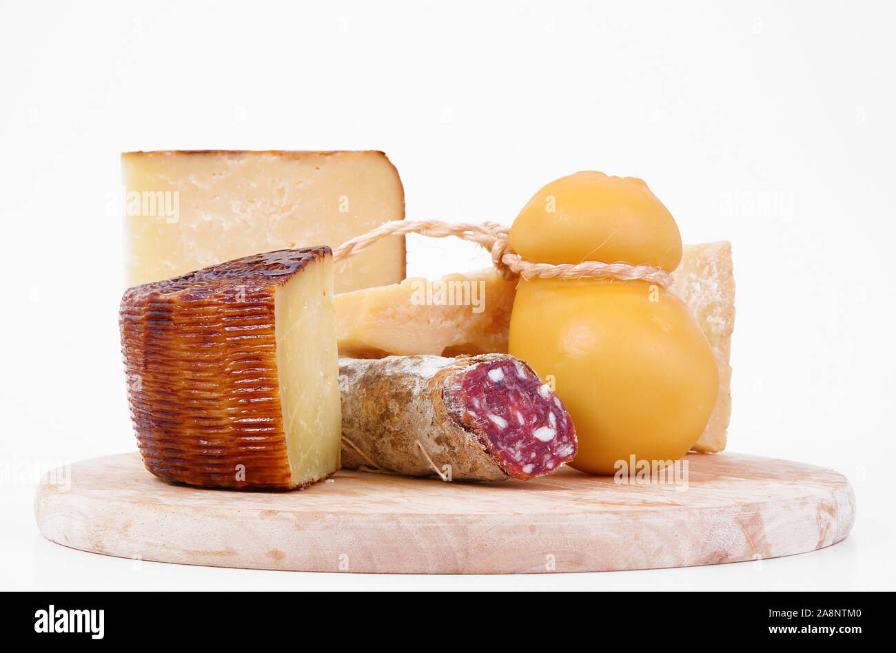 original italian cheese chopping on white background Stock Photo - Alamy
