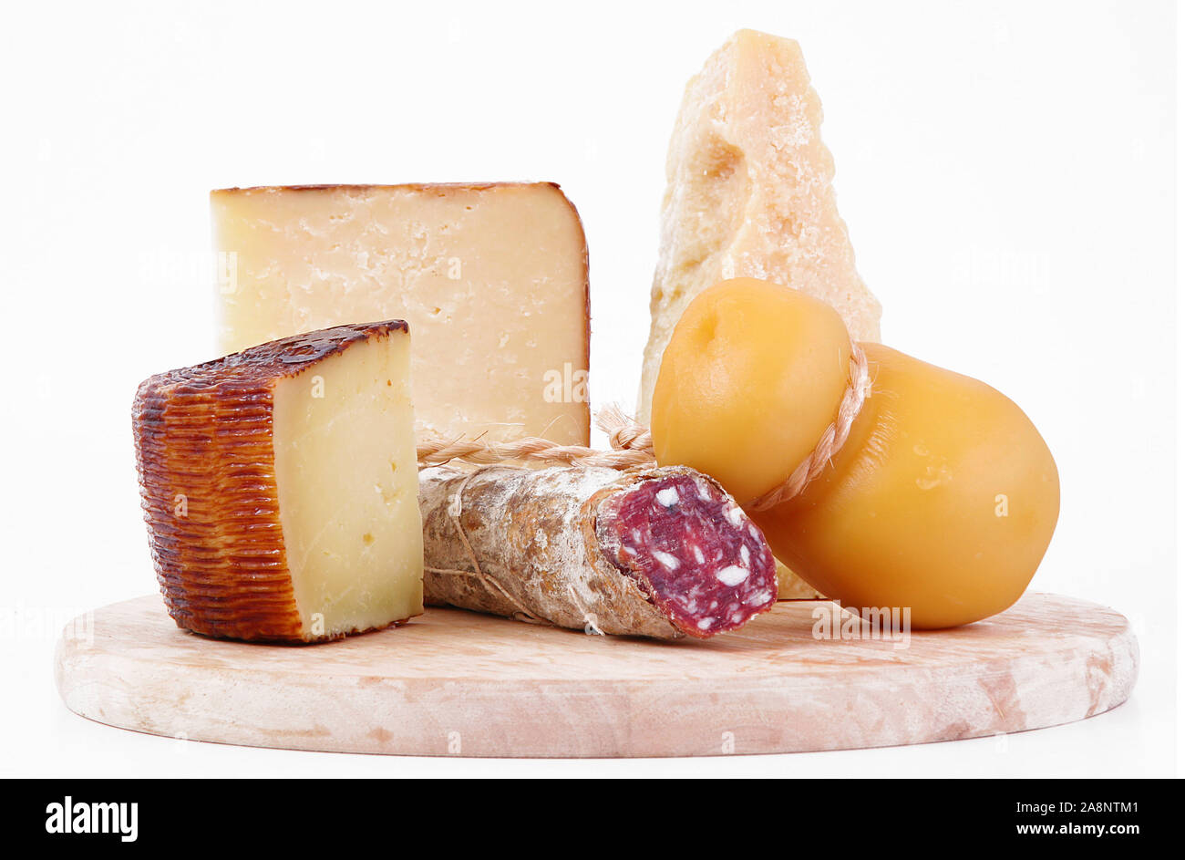 original italian cheese chopping on white background Stock Photo - Alamy