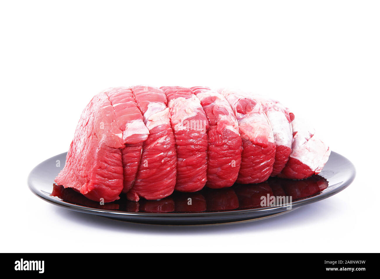 Raw beef meat for roast on white background Stock Photo - Alamy