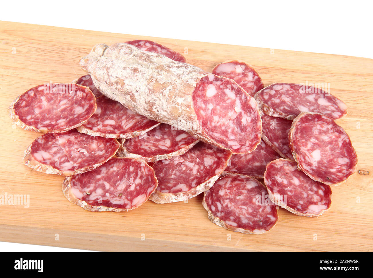 italian salami slice on chopping board background Stock Photo - Alamy