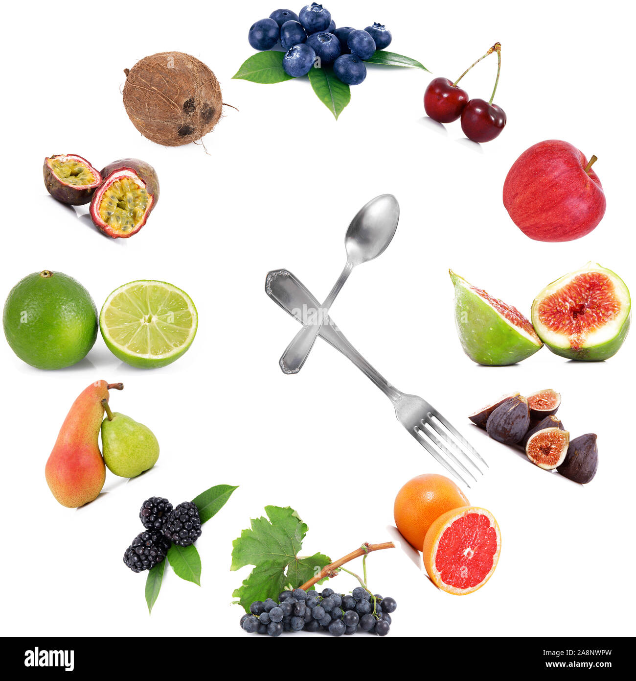 fruit clock on white background Stock Photo - Alamy