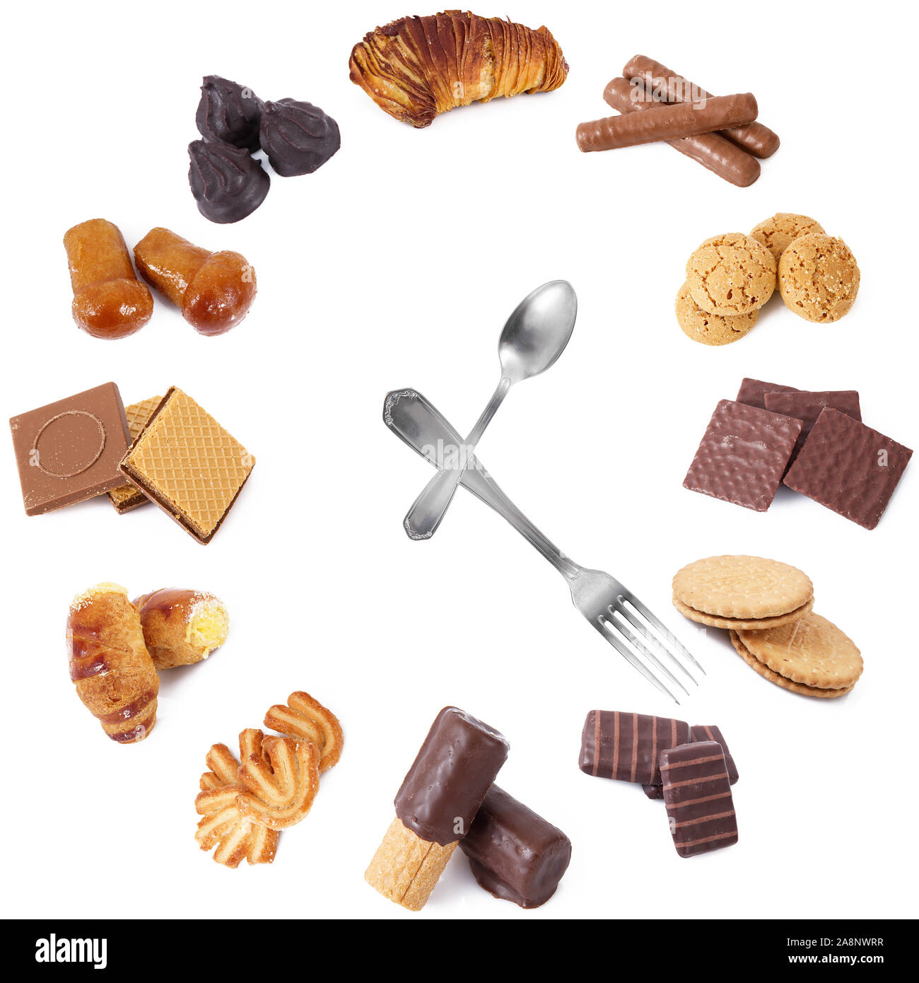 dessert clock on white background Stock Photo - Alamy