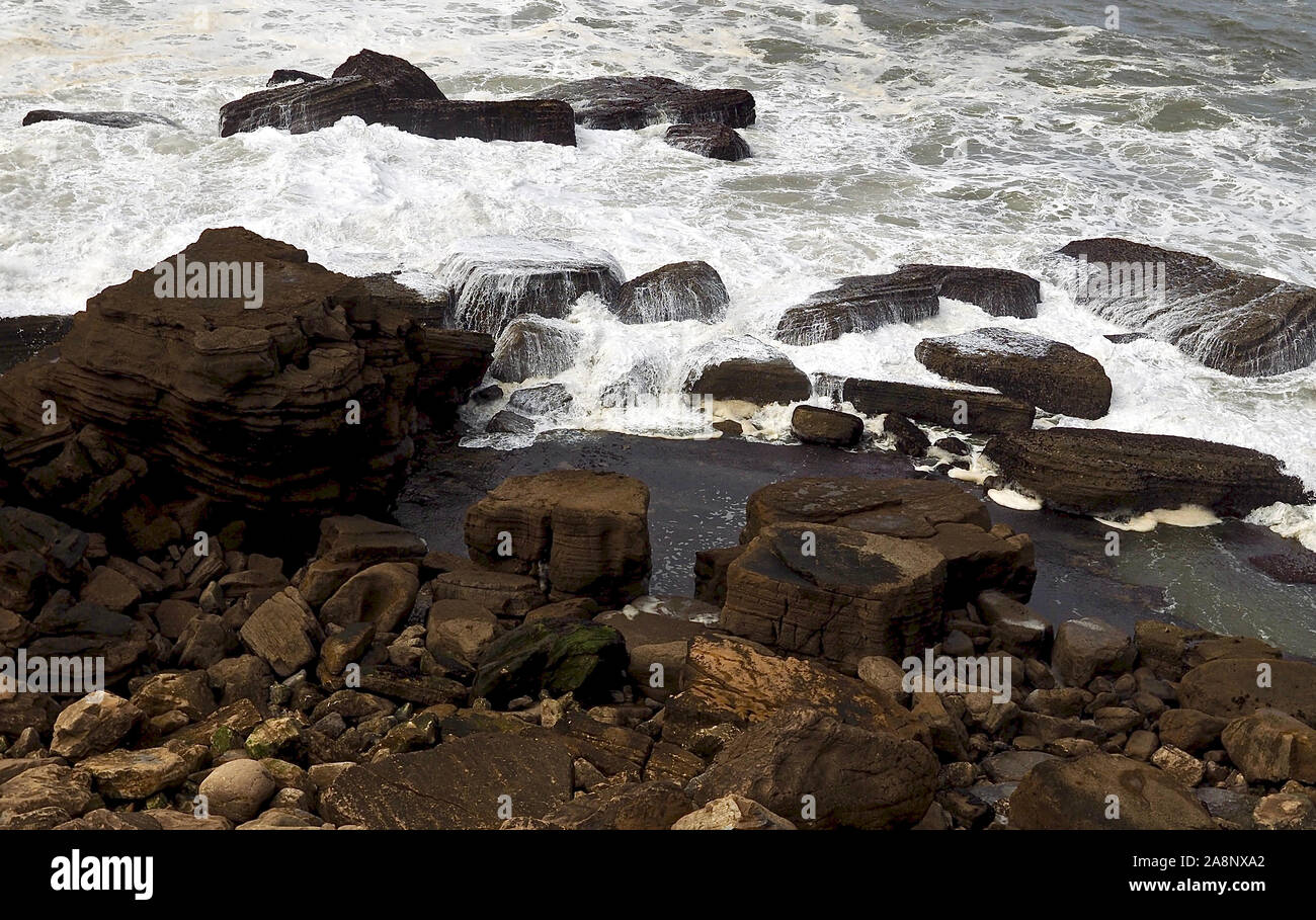 Huge interesting cliffs in Peniche in Portugal with a face Stock Photo ...
