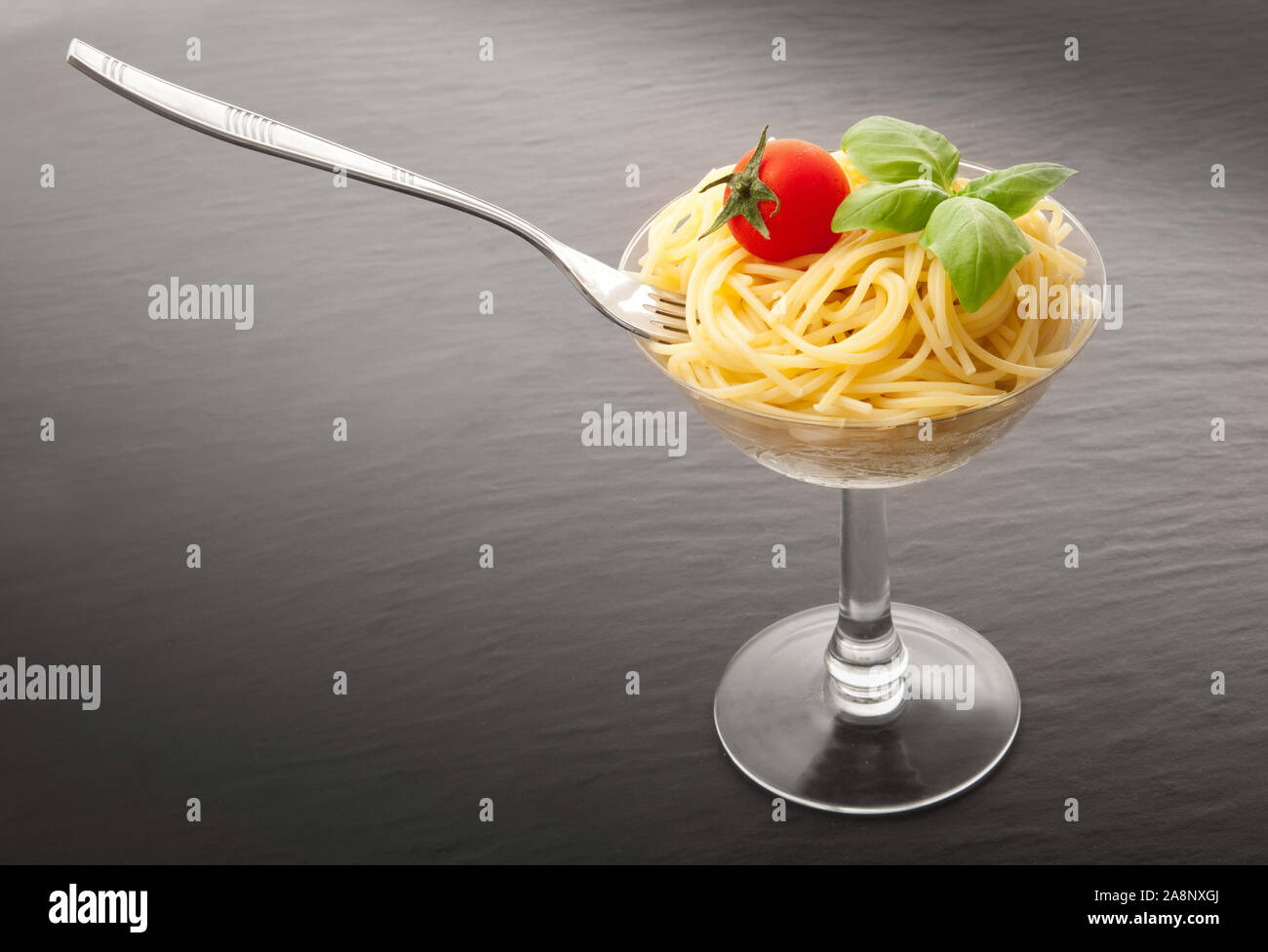 original italian spaghetti in glass Stock Photo - Alamy