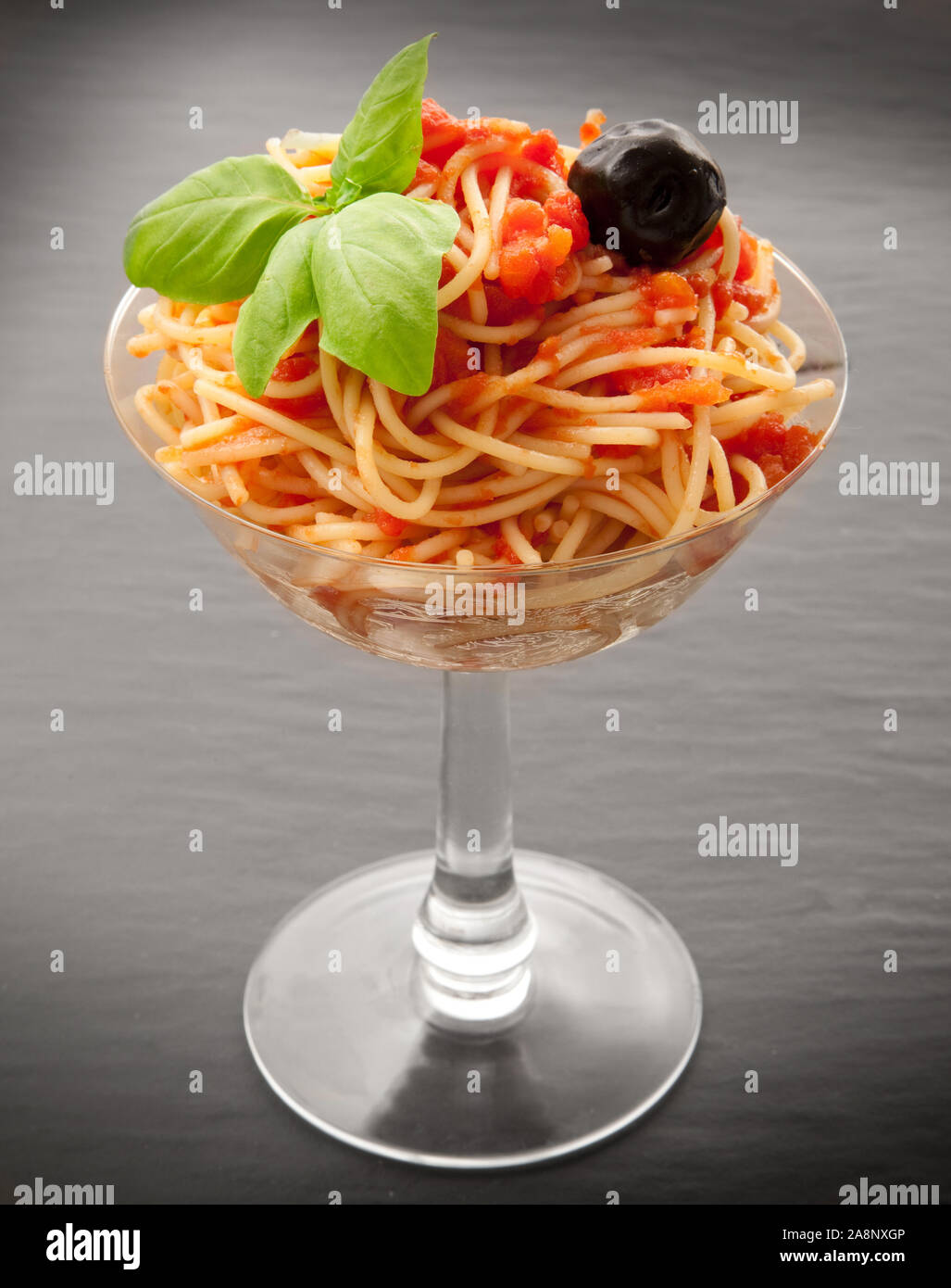 original italian spaghetti in glass Stock Photo - Alamy
